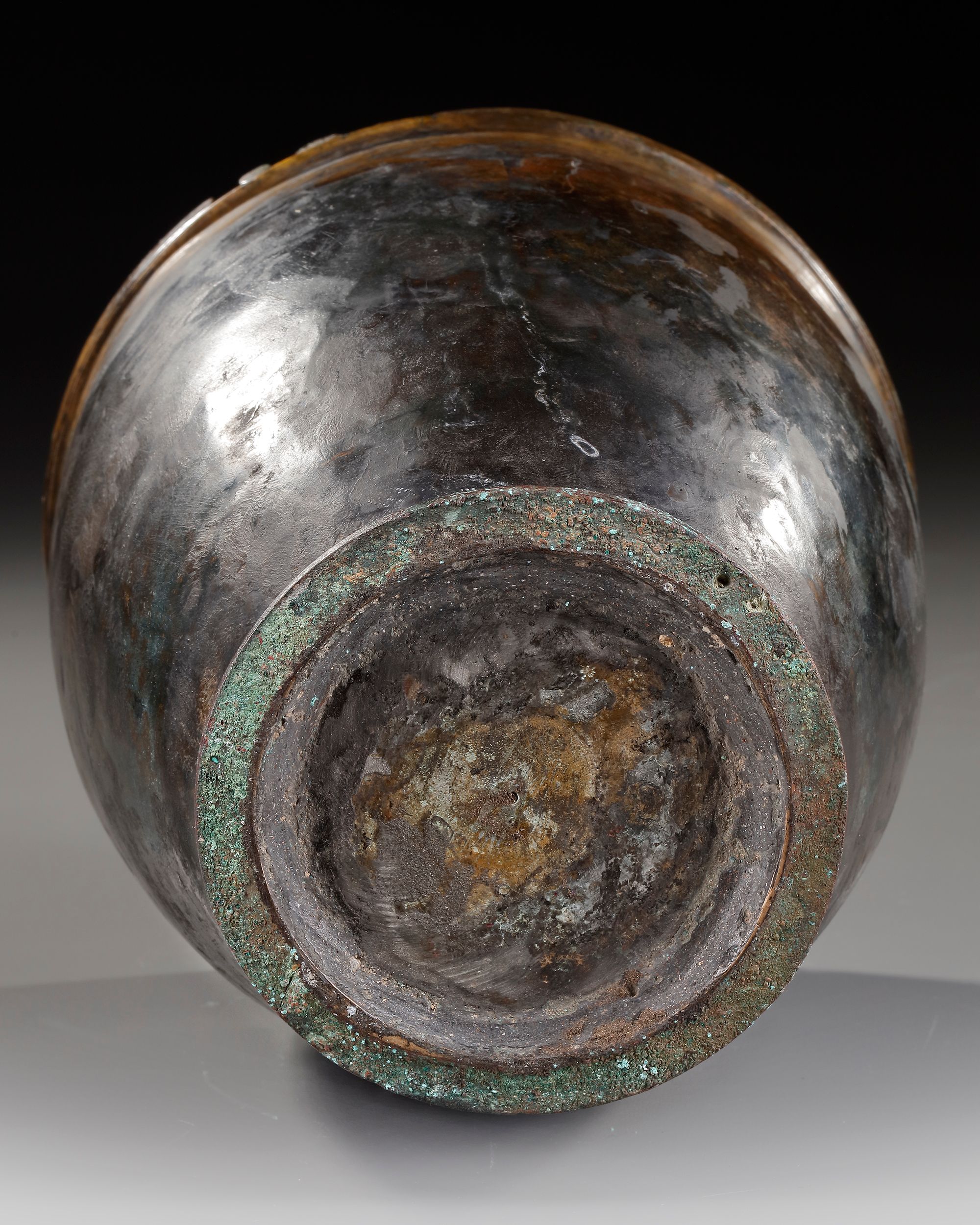 A GREEK BRONZE SITULA, CIRCA 4TH CENTURY B.C.