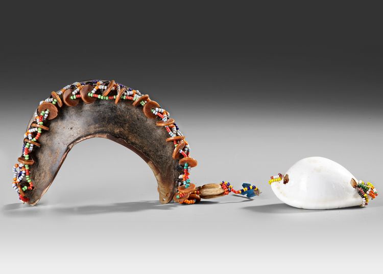 Two Kula gifts. Decorated shells from the Kula ring in South East Papua.