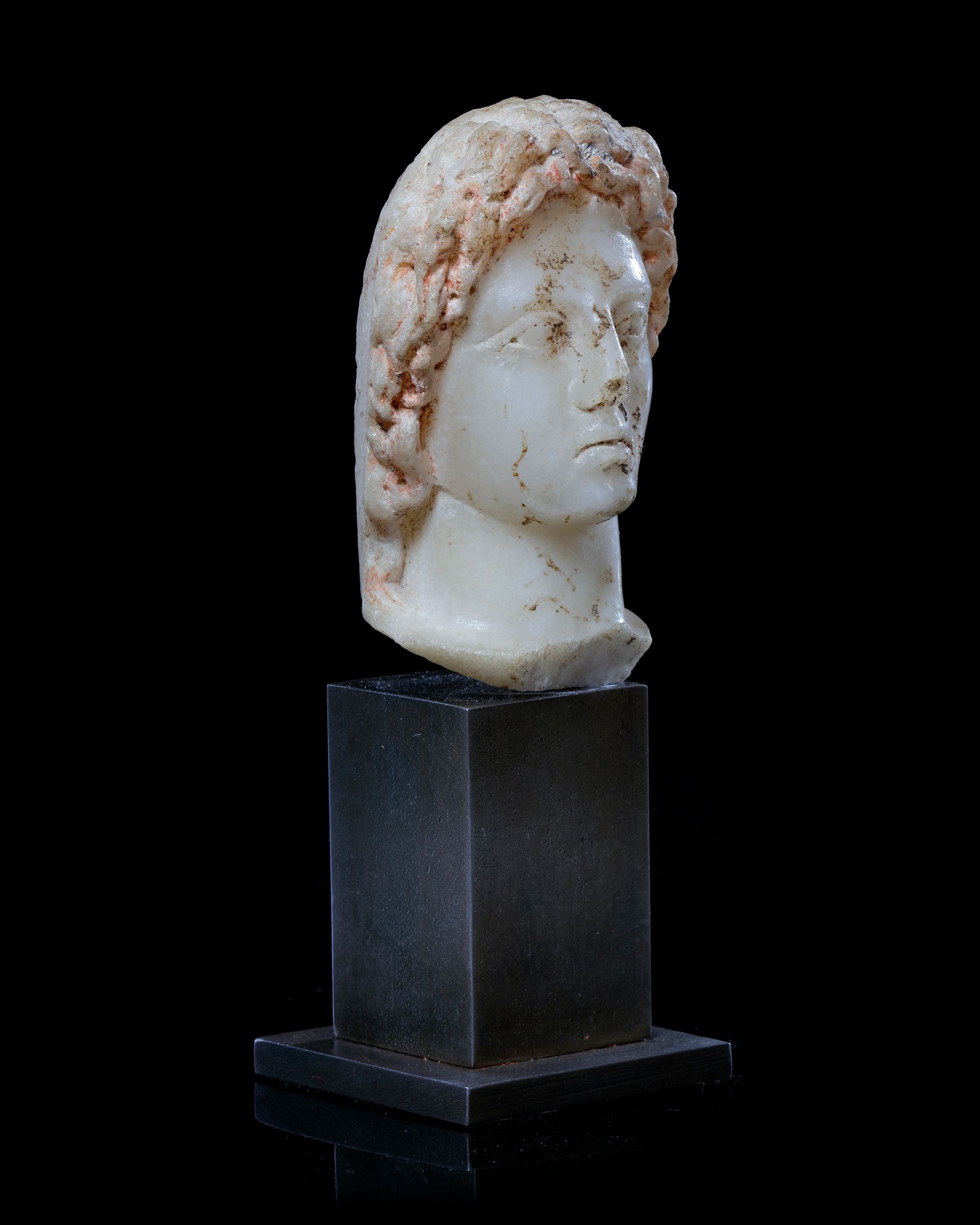 A MARBLE HEAD OF ALEXANDER, HELLENISTIC 2ND-3RD CENTURY BC