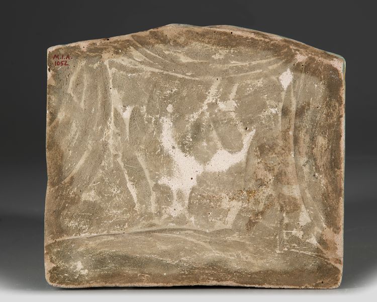 A FINE RAQQA TURQUOISE GLAZED POTTERY TILE, SYRIA, LATE 12TH CENTURY