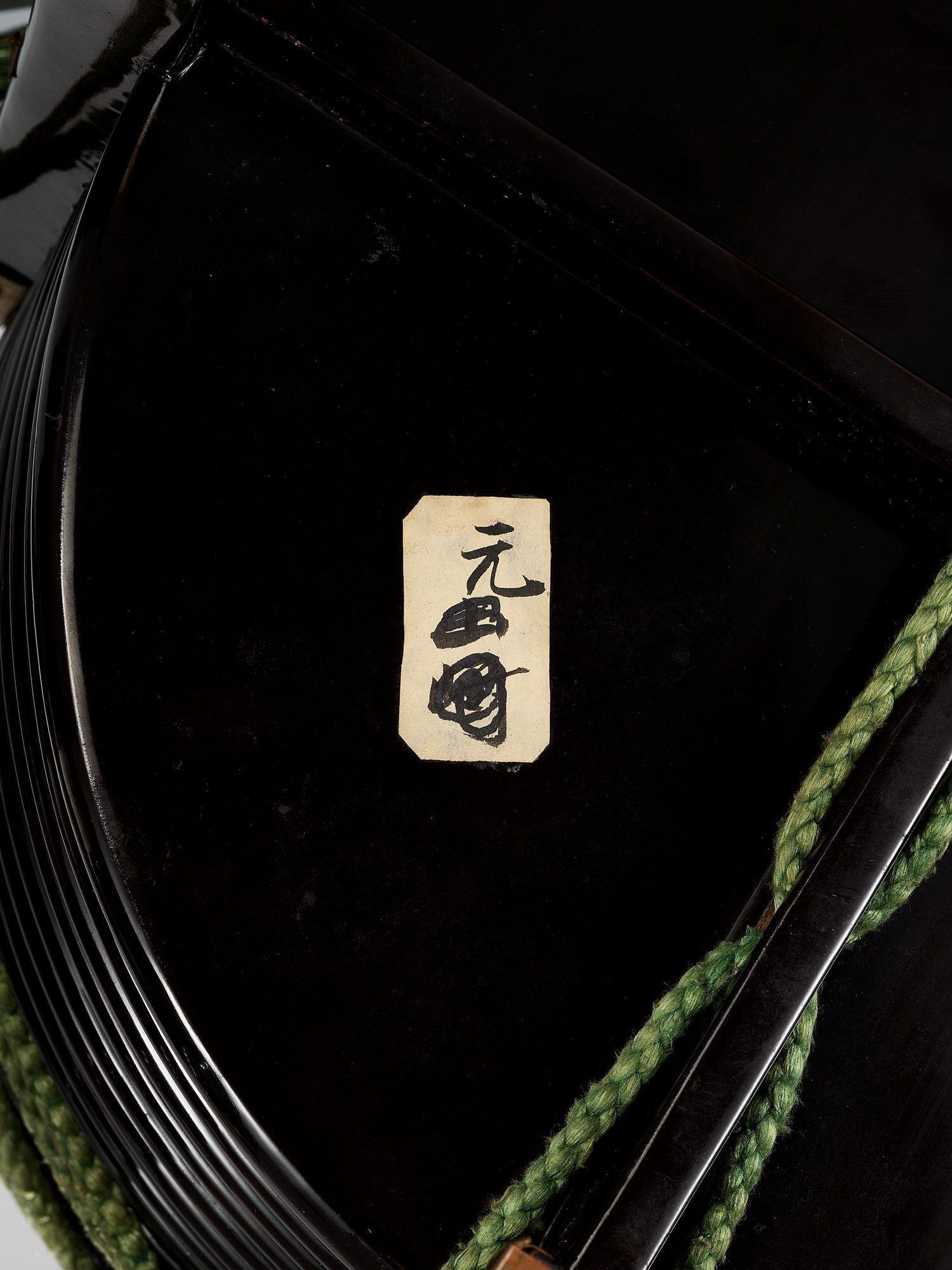 A LACQUERED HOKAI WITH GOLD BUTTERFLY CREST