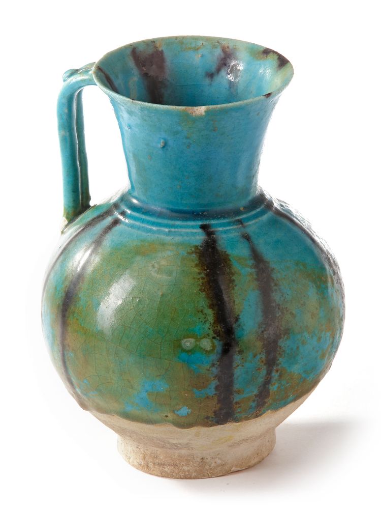 A RAQQA WARE VESSEL, SYRIA, FIRST HALF 13TH CENTURY