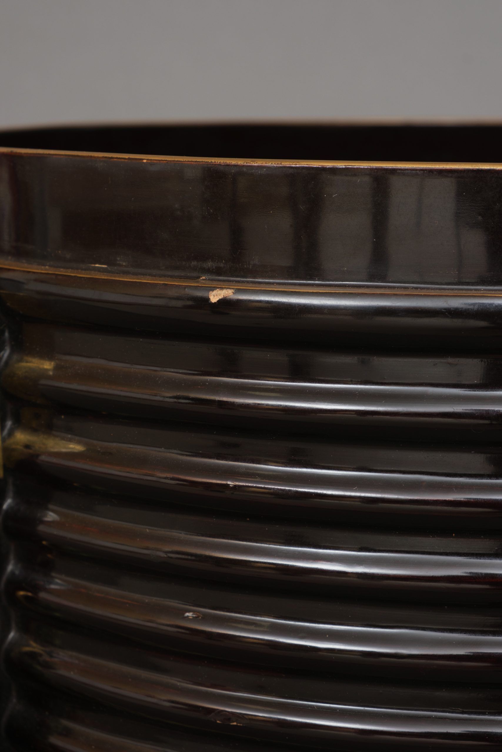 A LACQUERED HOKAI WITH GOLD BUTTERFLY CREST