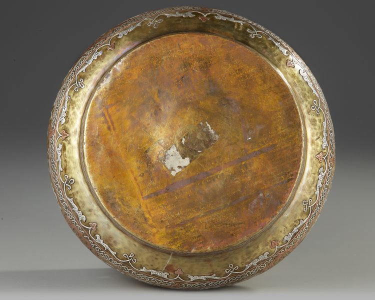 A CAIROWARE SILVER AND COPPER INLAID BRASS BOWL, EGYPT OR SYRIA, EARLY ...