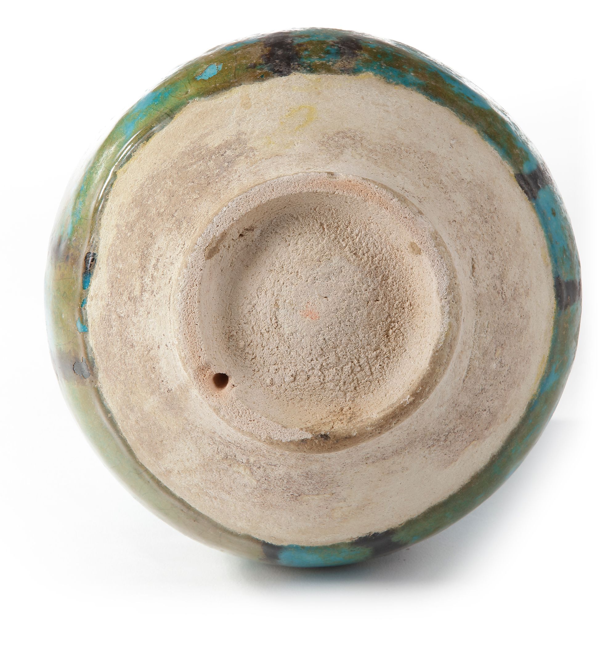 A RAQQA WARE VESSEL, SYRIA, FIRST HALF 13TH CENTURY